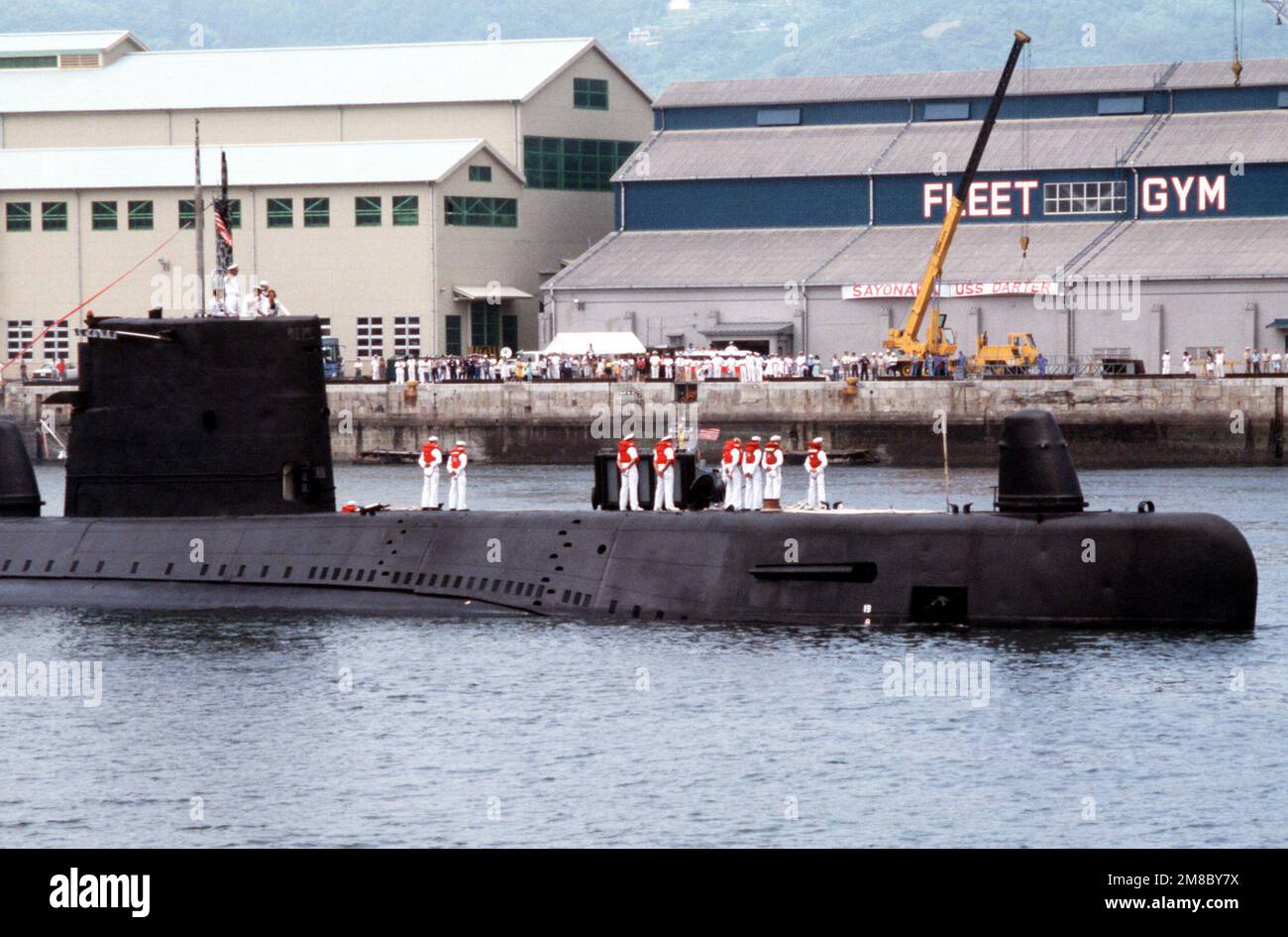 Spectators line the pier as the attack submarine USS DARTER (SS 576 ...