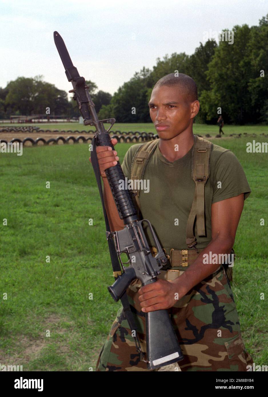 Marine Corps Recruit Depot. A 1ST Battalion recruit armed with a ...