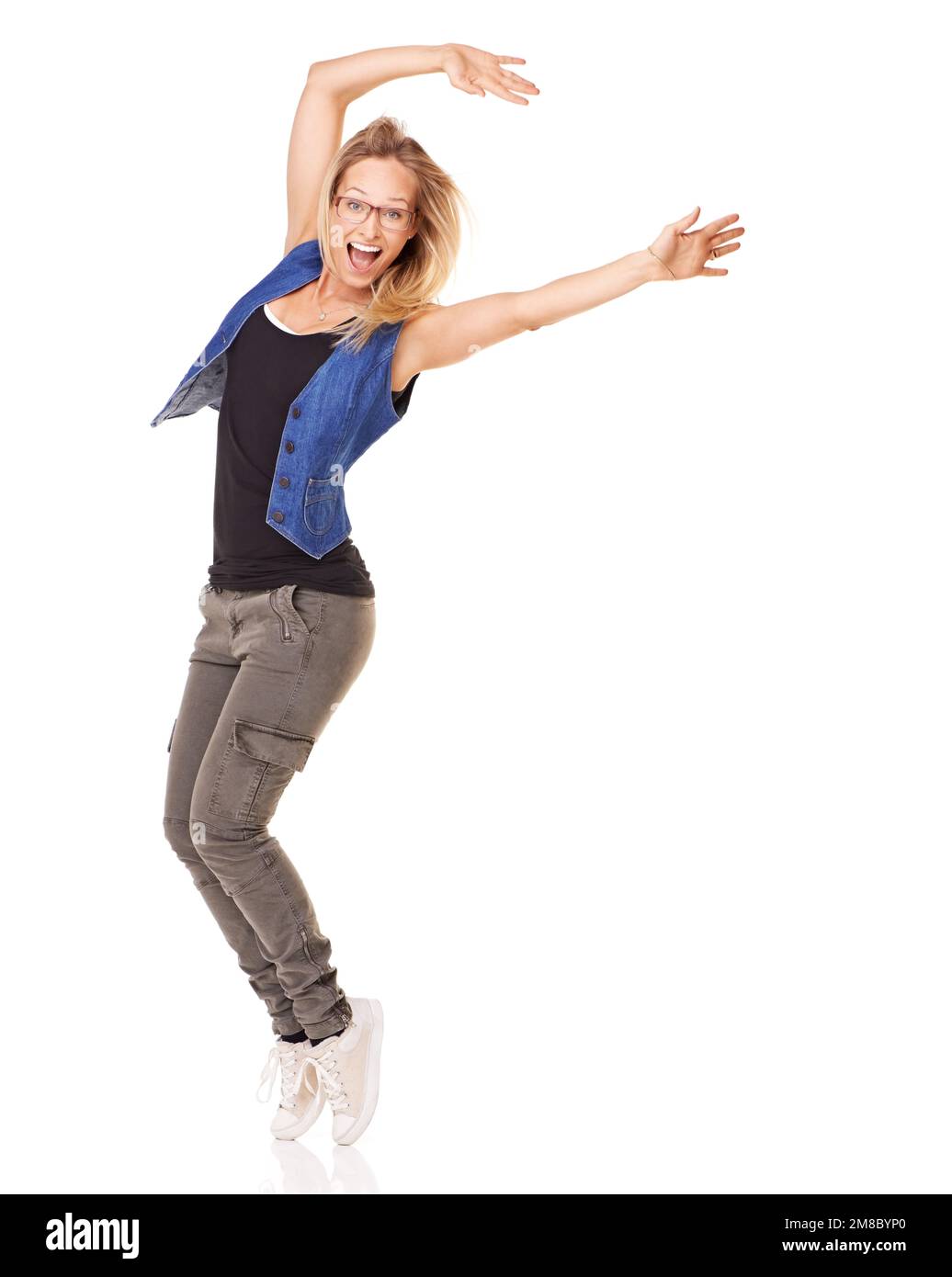 Portrait, dance and mockup with a woman excited in studio on a white ...