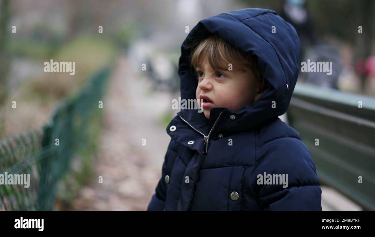 Cute child walking outside during winter season at park2 Stock Photo ...