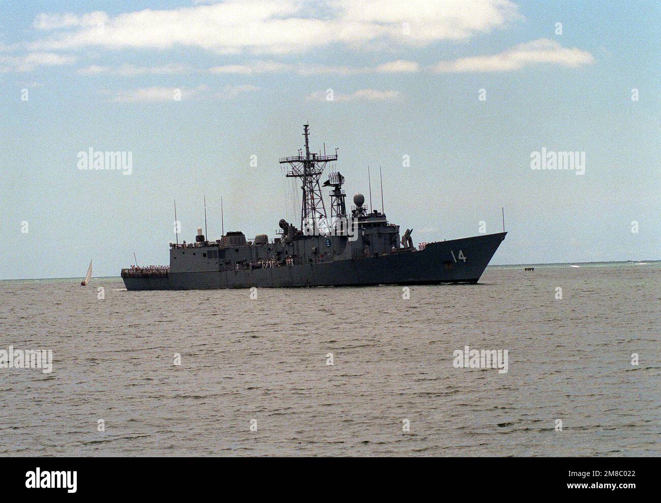 The guided missile frigate USS JOHN H. SIDES (FFG-14) heads into the ...