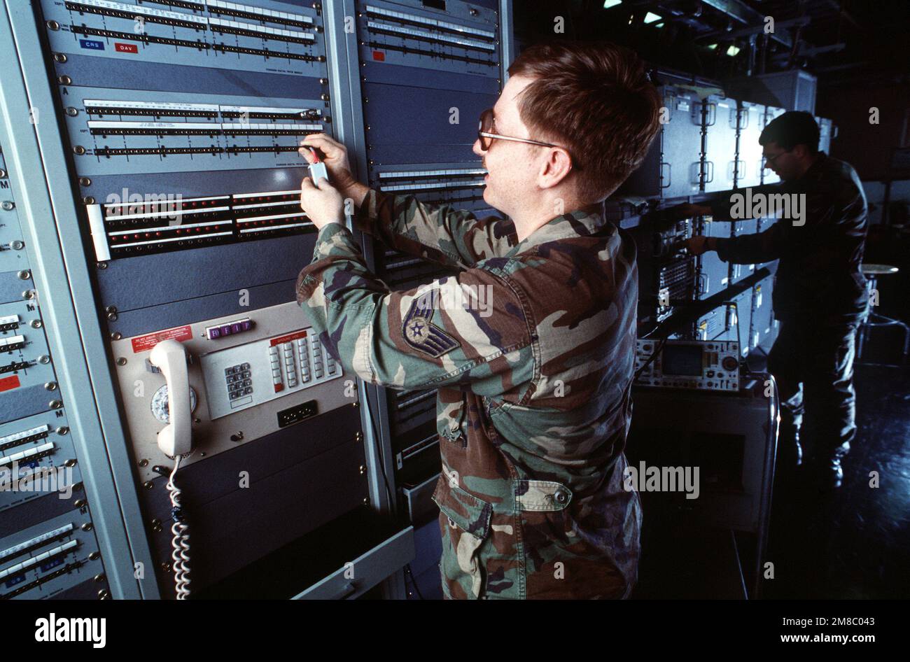 SSGT Richard L. Lawson, foreground, and SSGT Scott S. Towsky, wide-band ...