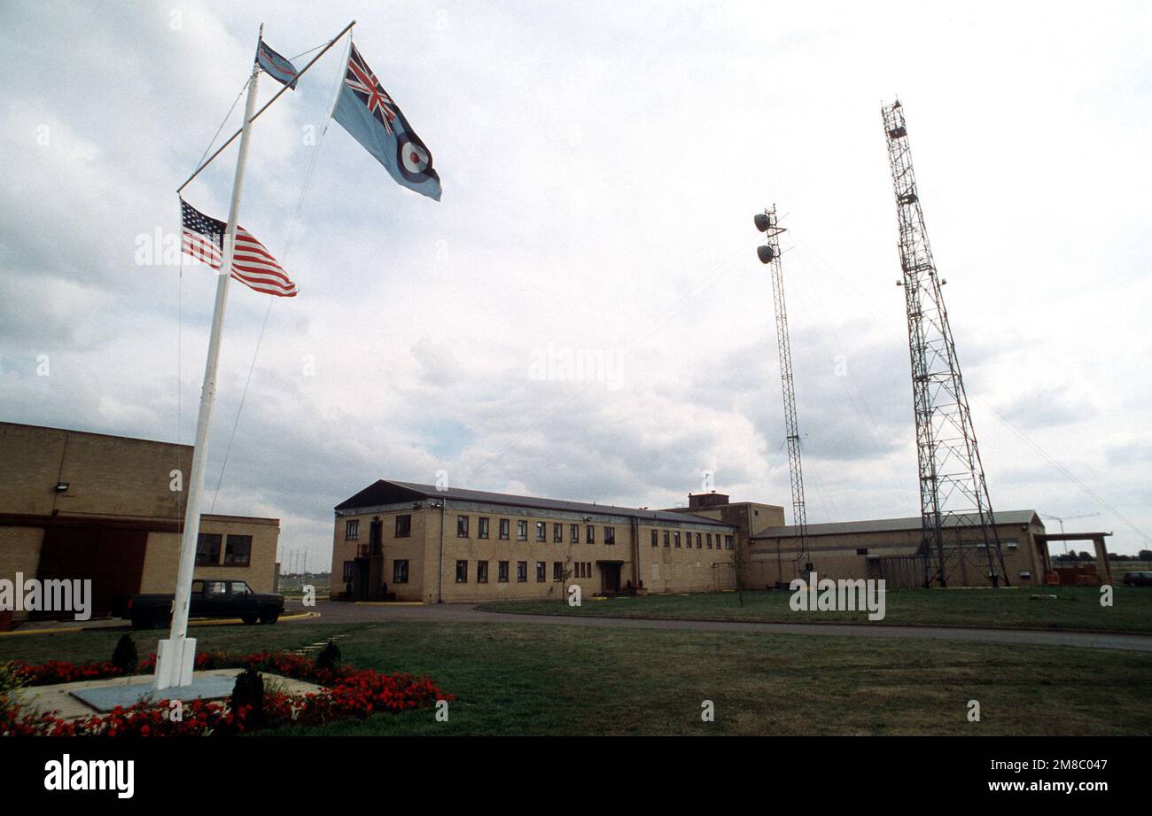The flags of the United States and the Royal Air Force fly at the base ...