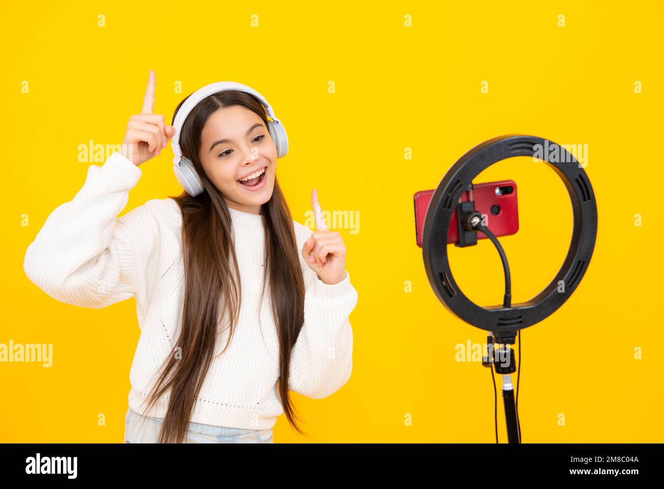 Teenage girl recording music hi-res stock photography and images - Alamy