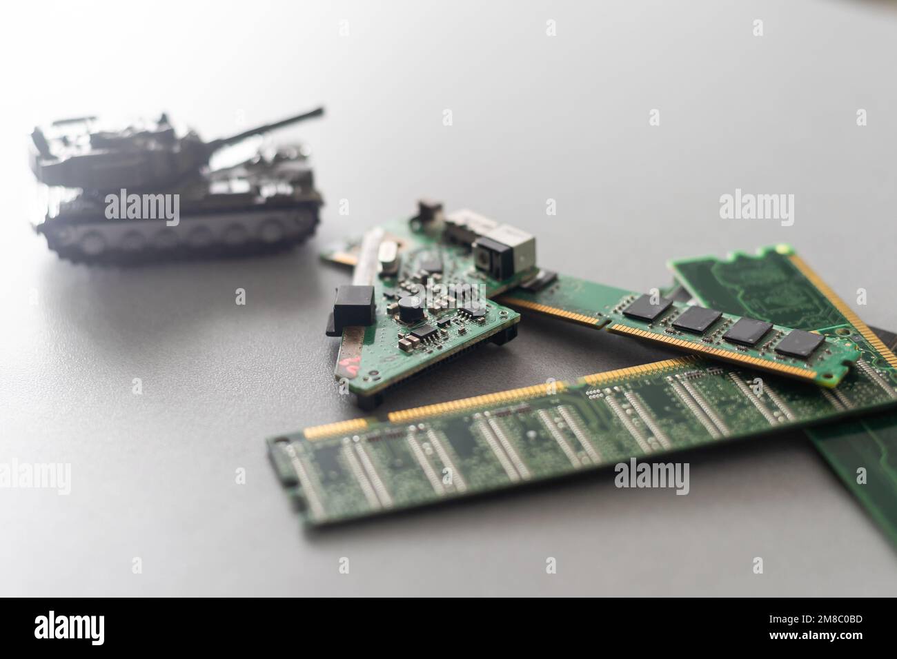 computer chips and a toy tank Stock Photo - Alamy