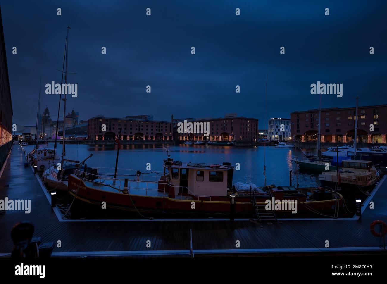 The Waterfront Royal Albert Dock at night in Liverpool, UK Stock Photo ...