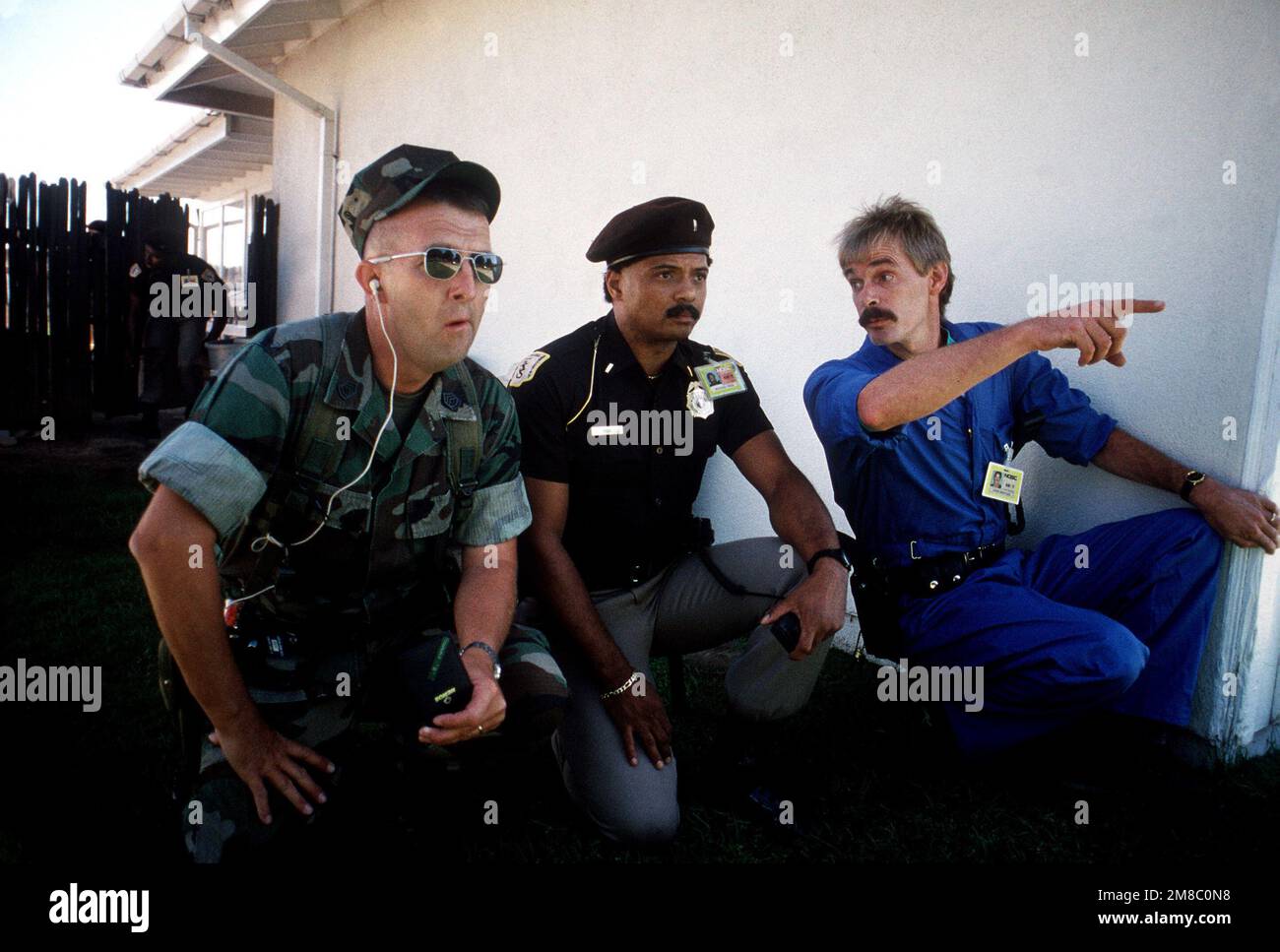 Security personnel plan their next move while taking part in a hostage ...