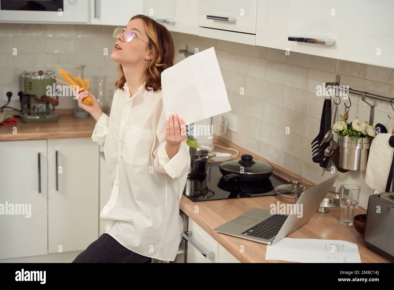 Beginner cook waiting for inspiration from above Stock Photo - Alamy