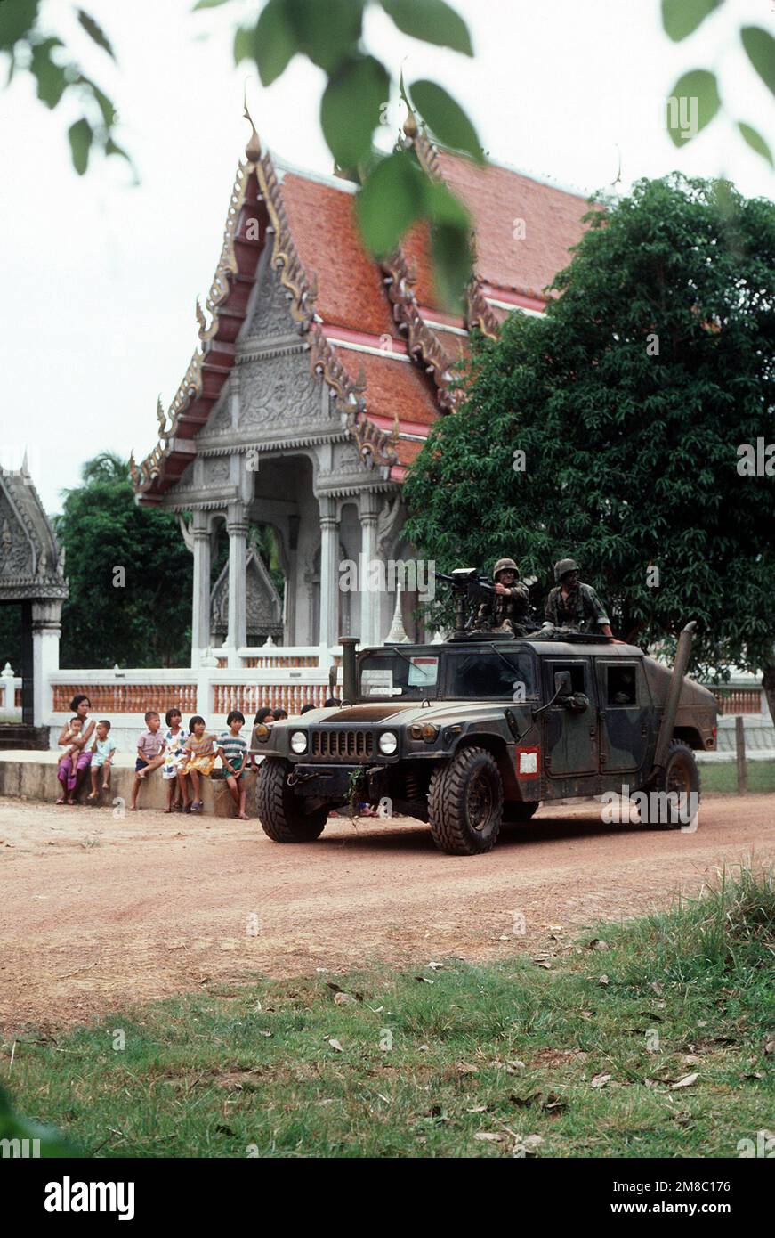Marines of the 11th Marine Expeditionary Unit (11th MEU) man a Mark 19 ...