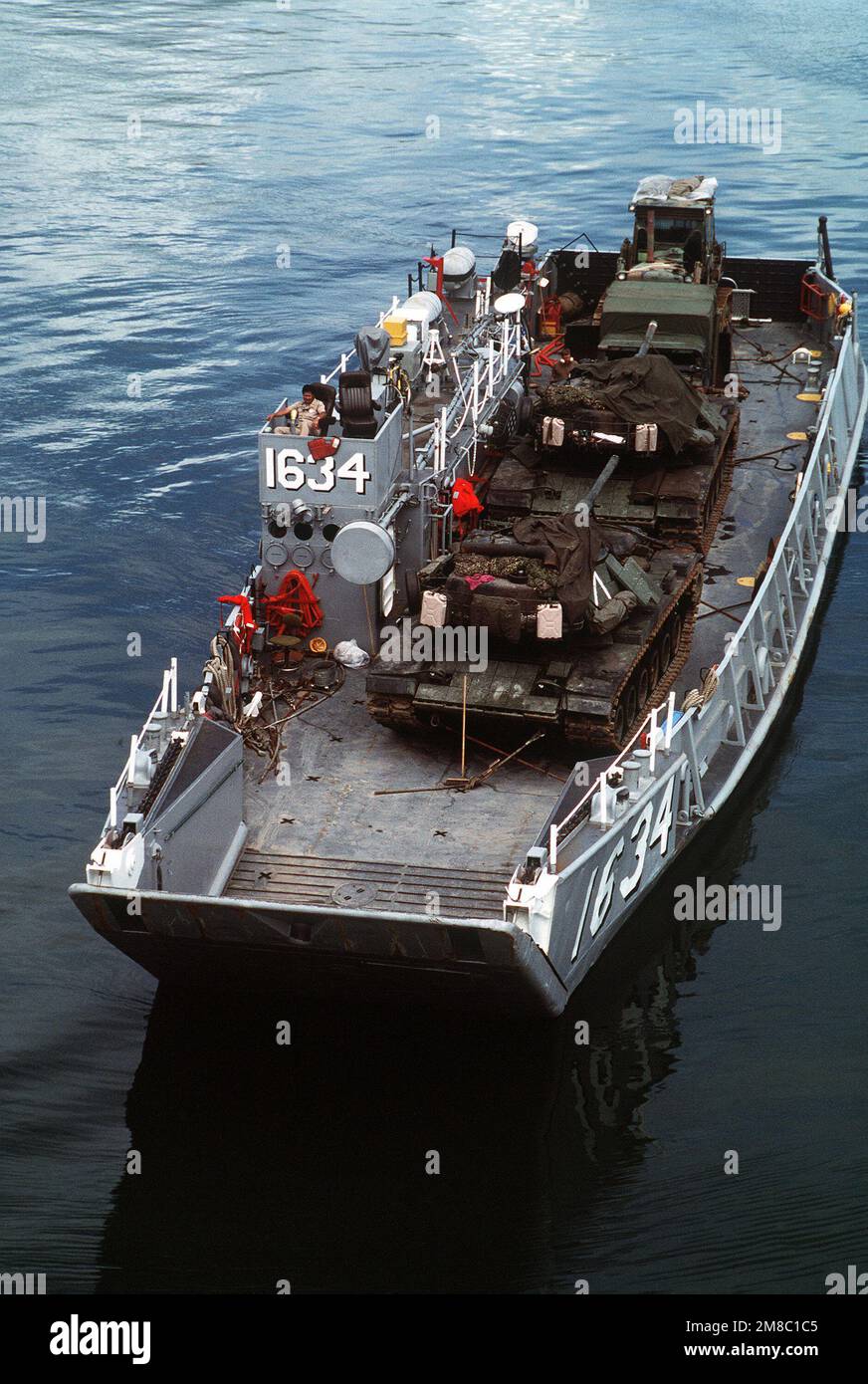 The utility landing craft LCU-1634 transports two U.S. Marine Corps M ...