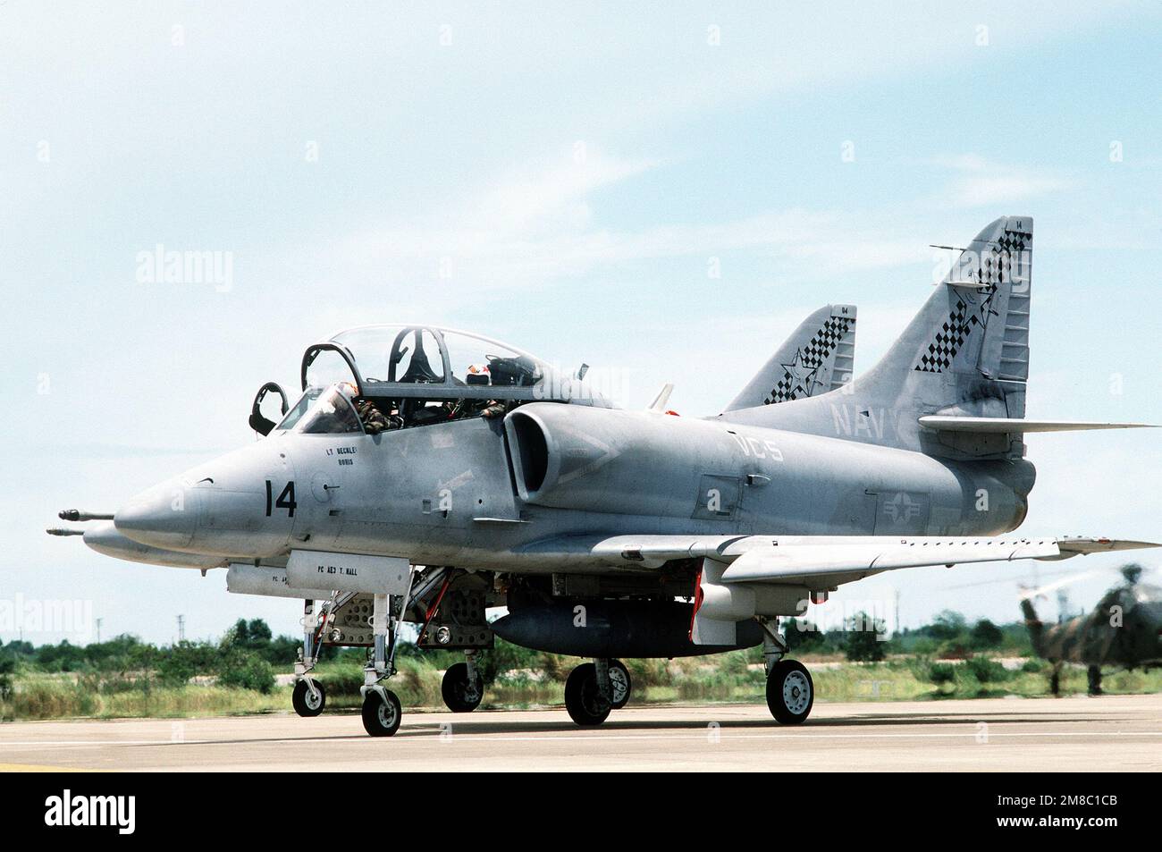 A Fleet Composite Squadron 5 (VC-5) TA-4J Skyhawk aircraft taxis on the ...