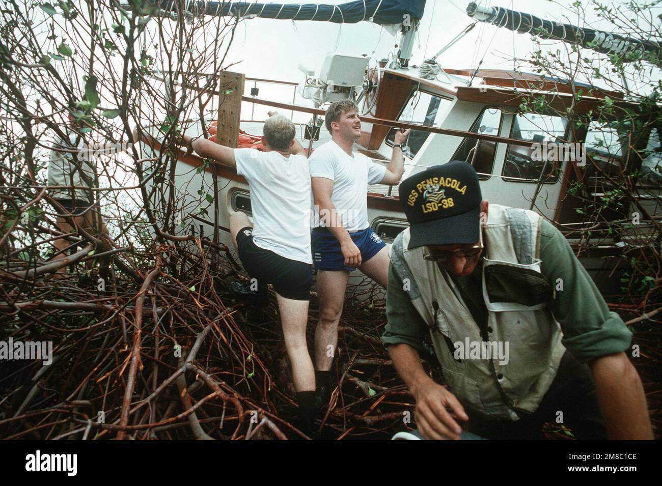 In the wake of Hurricane Hugo, a disaster relief party from the dock ...