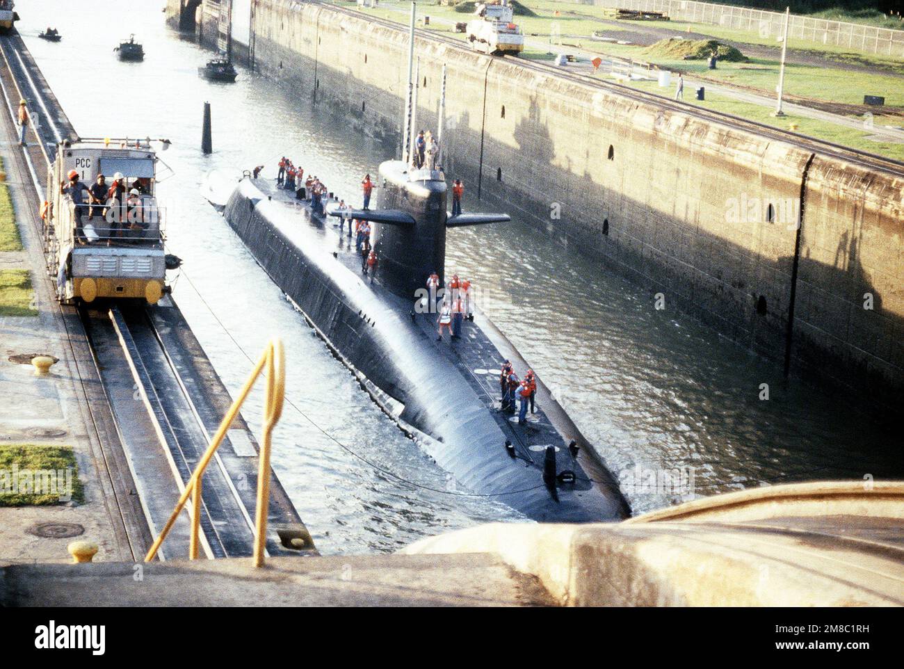 Crewmen stand on the deck of a U.S. Navy Lafayette Class nuclear ...