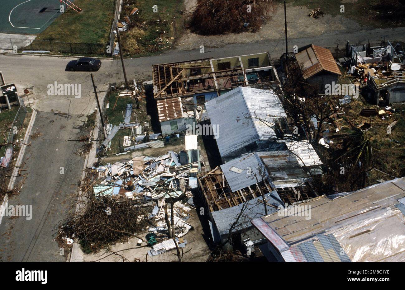 An aerial view of a buildings damaged by Hurricane Hugo. Base: Saint ...