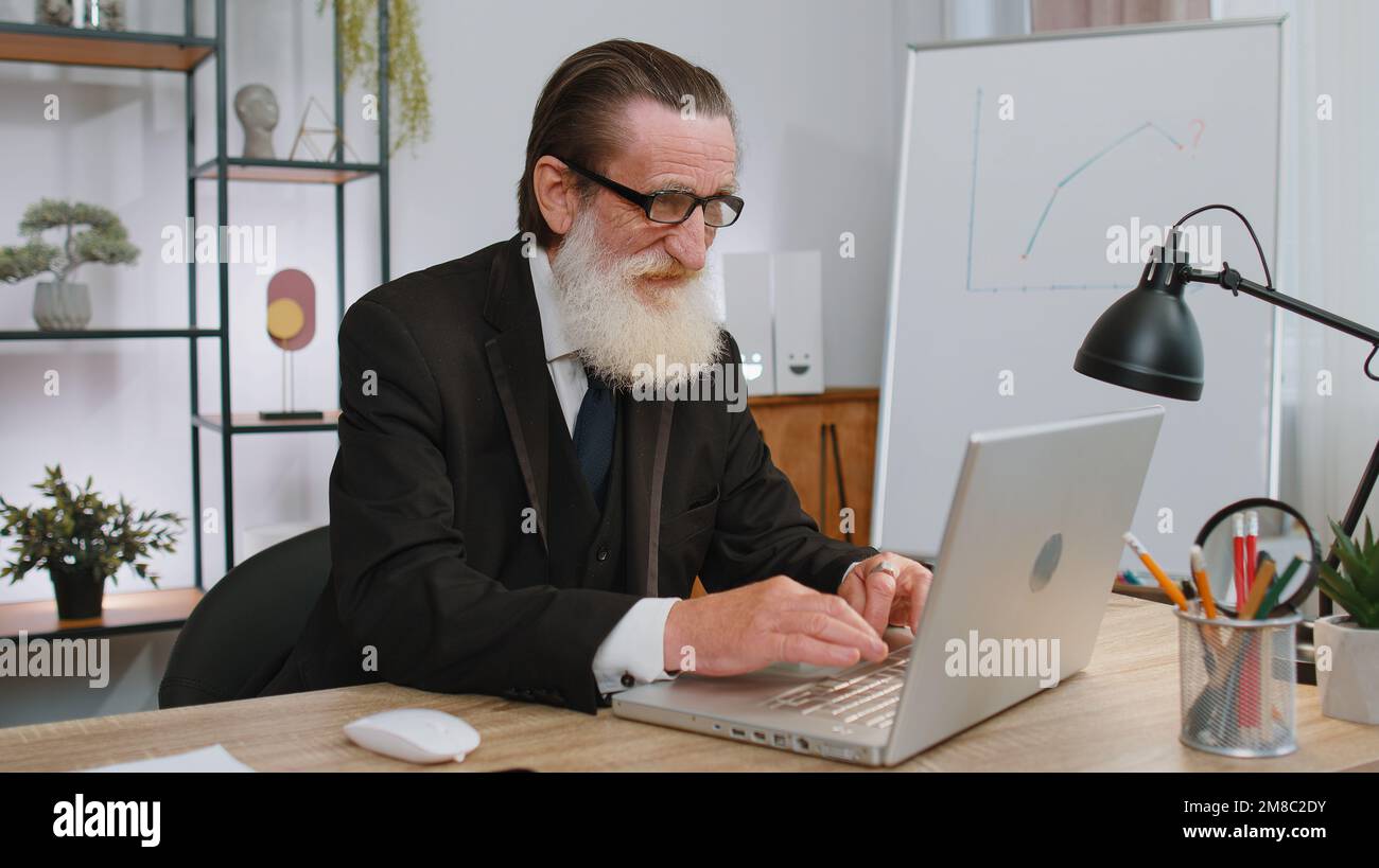 Man opens notebook typing on hi-res stock photography and images - Alamy