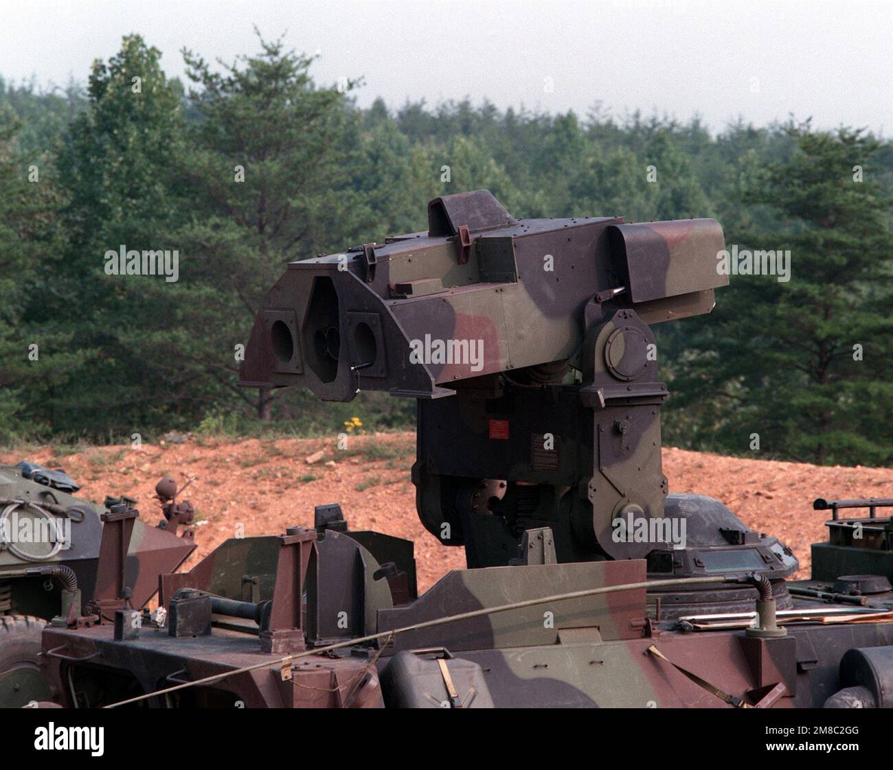 A close-up view of the twin tube-launched, optically tracked, wire ...