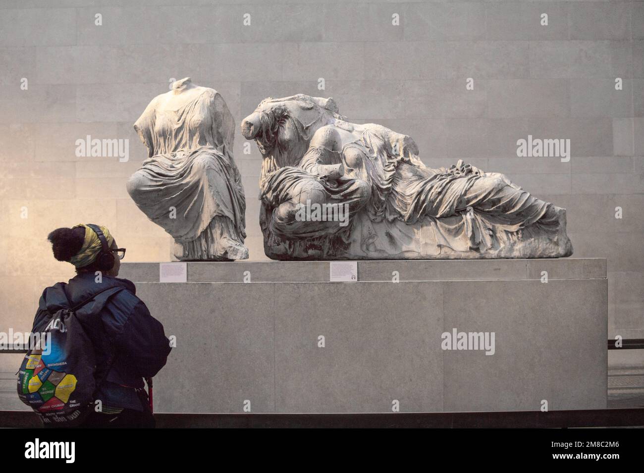 Visitors view the Parthenon Marbles, also known as the Elgin Marbles, at the British Museum in ...