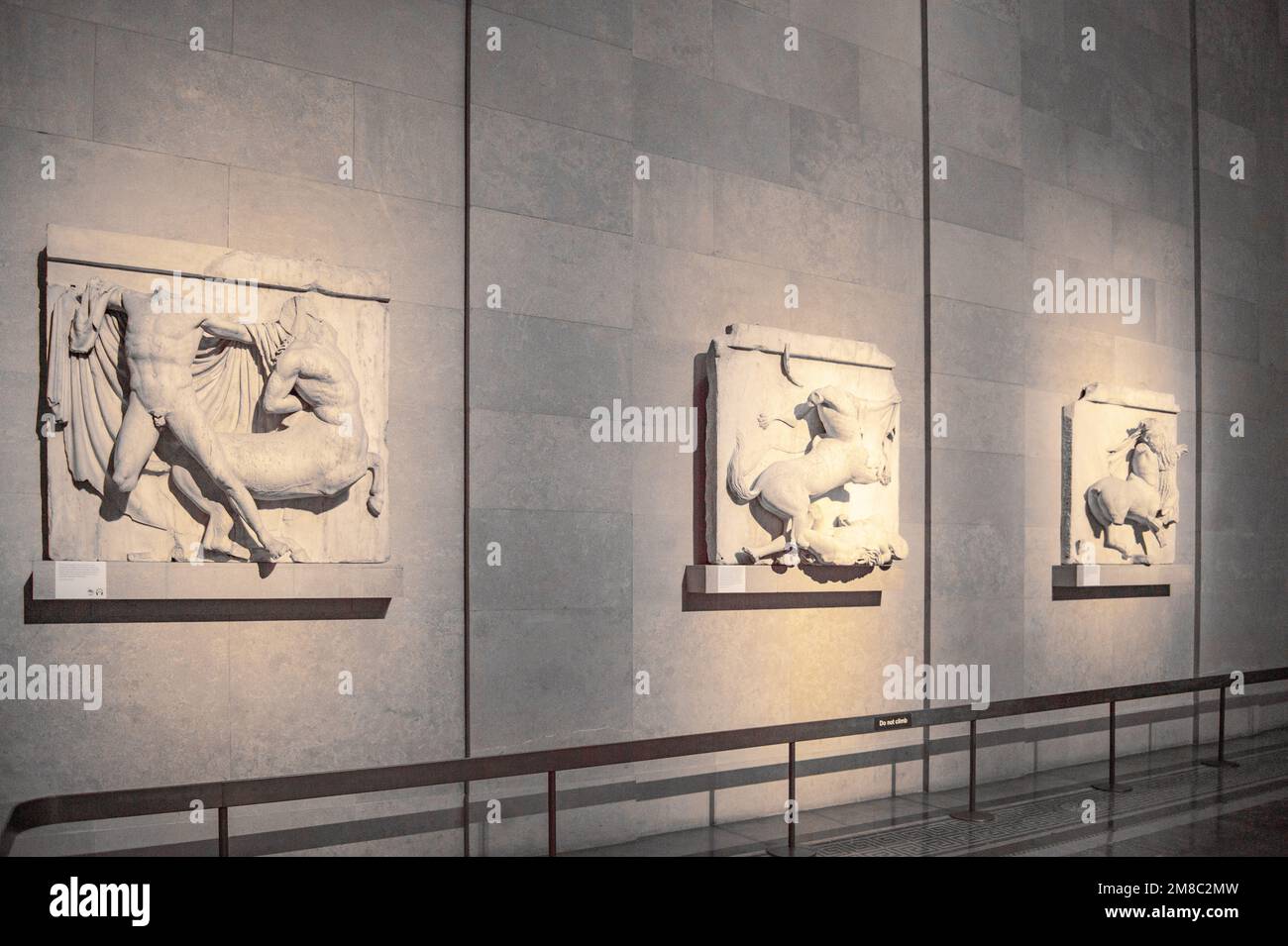 Visitors view the Parthenon Marbles, also known as the Elgin Marbles, at the British Museum in ...