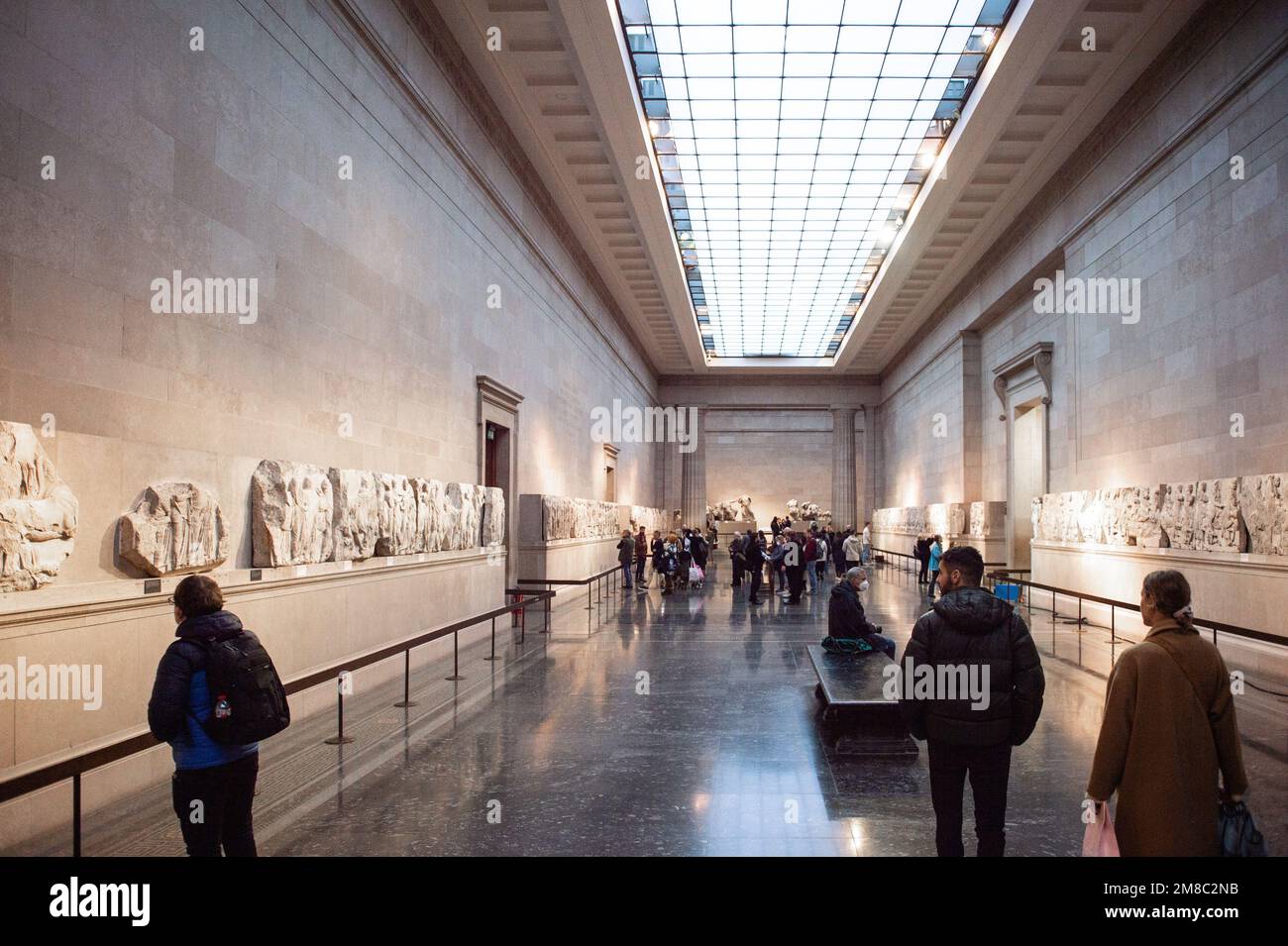 Visitors view the Parthenon Marbles, also known as the Elgin Marbles, at the British Museum in ...