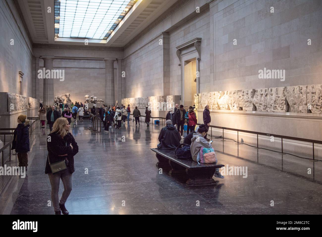 Visitors view the Parthenon Marbles, also known as the Elgin Marbles ...