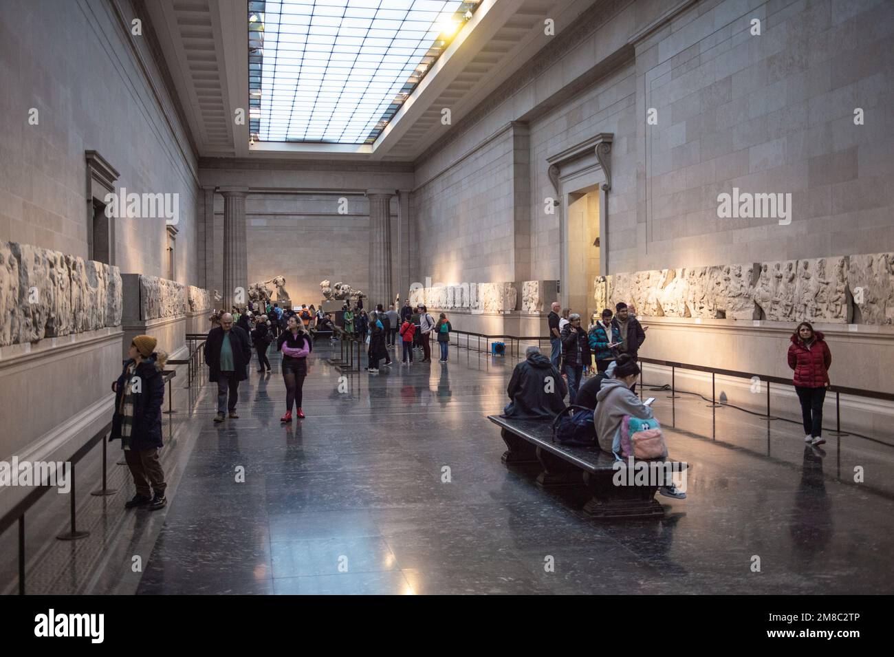 Visitors view the Parthenon Marbles, also known as the Elgin Marbles, at the British Museum in ...
