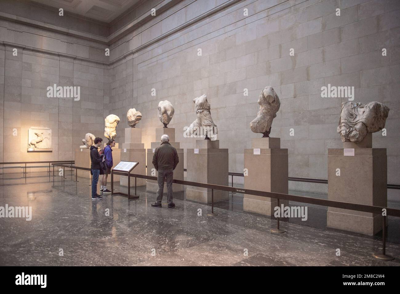 Visitors view the Parthenon Marbles, also known as the Elgin Marbles, at the British Museum in ...