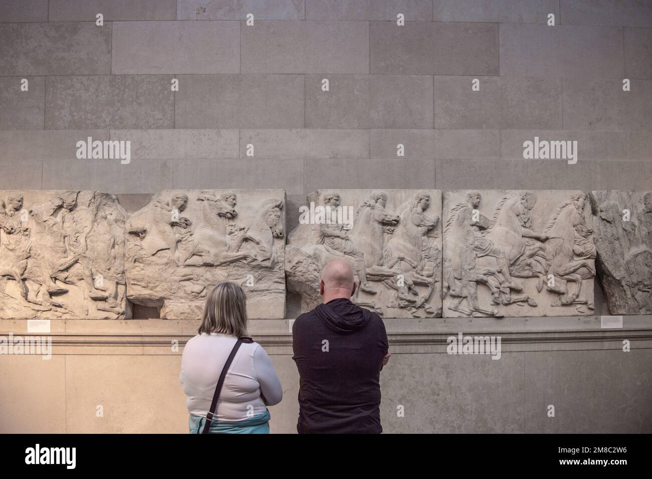 Visitors view the Parthenon Marbles, also known as the Elgin Marbles, at the British Museum in ...
