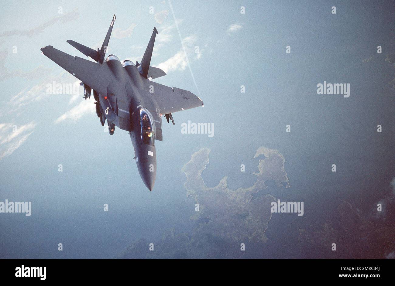 A 336th Tactical Fighter Squadron F-15E Eagle aircraft breaks away ...