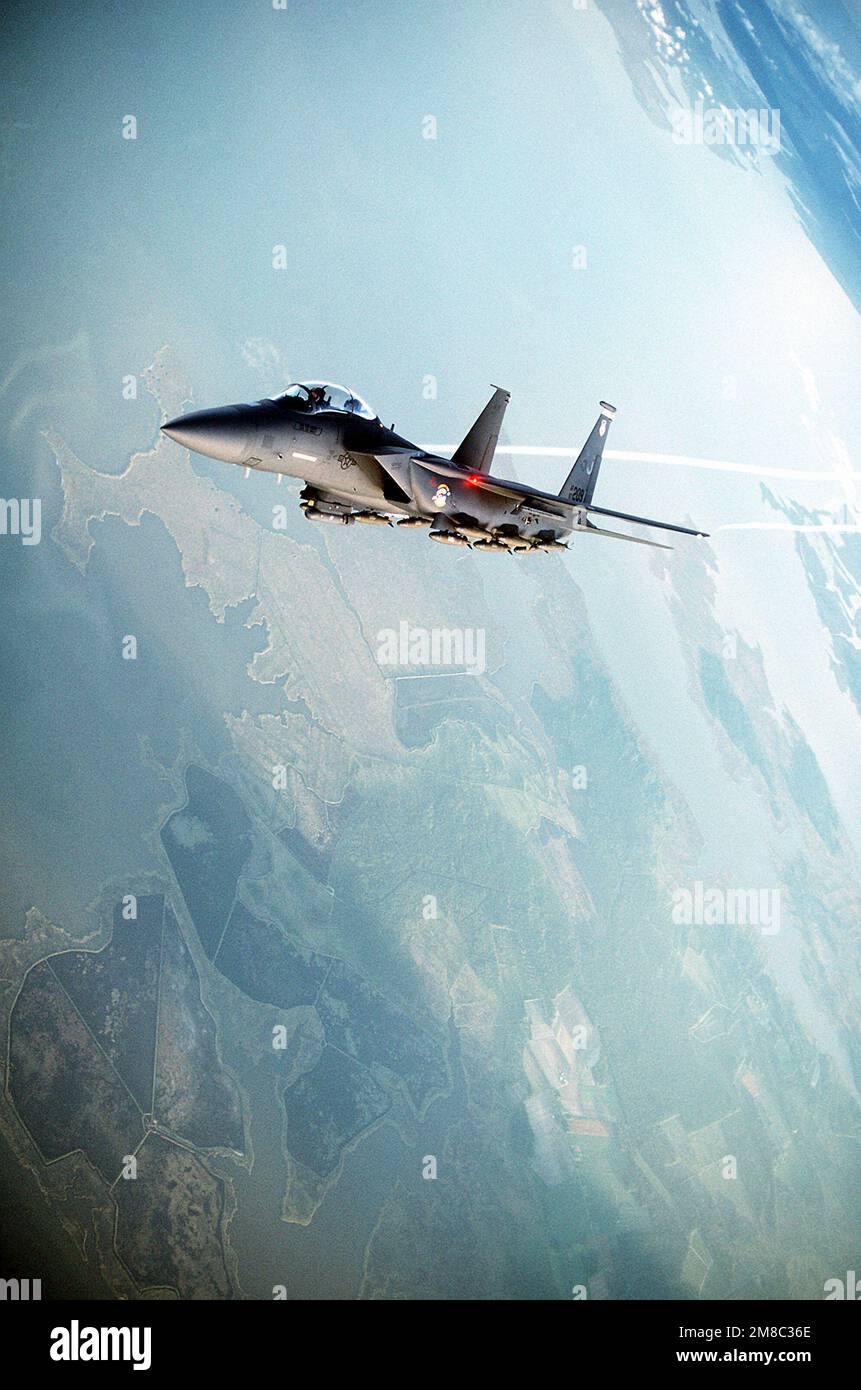 A 336th Tactical Fighter Squadron F-15E Eagle aircraft breaks away ...