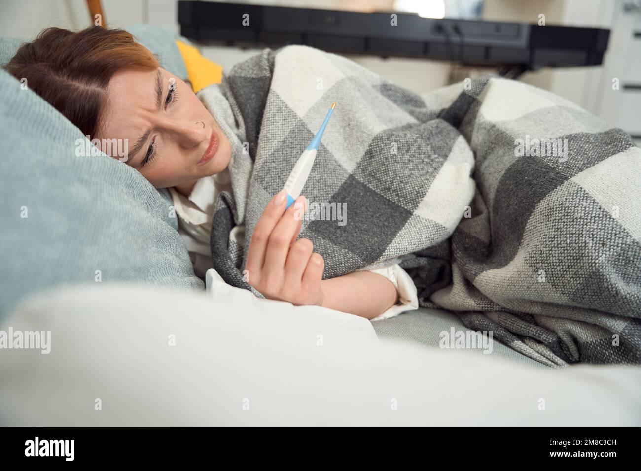 Taking body temperature hi-res stock photography and images - Alamy