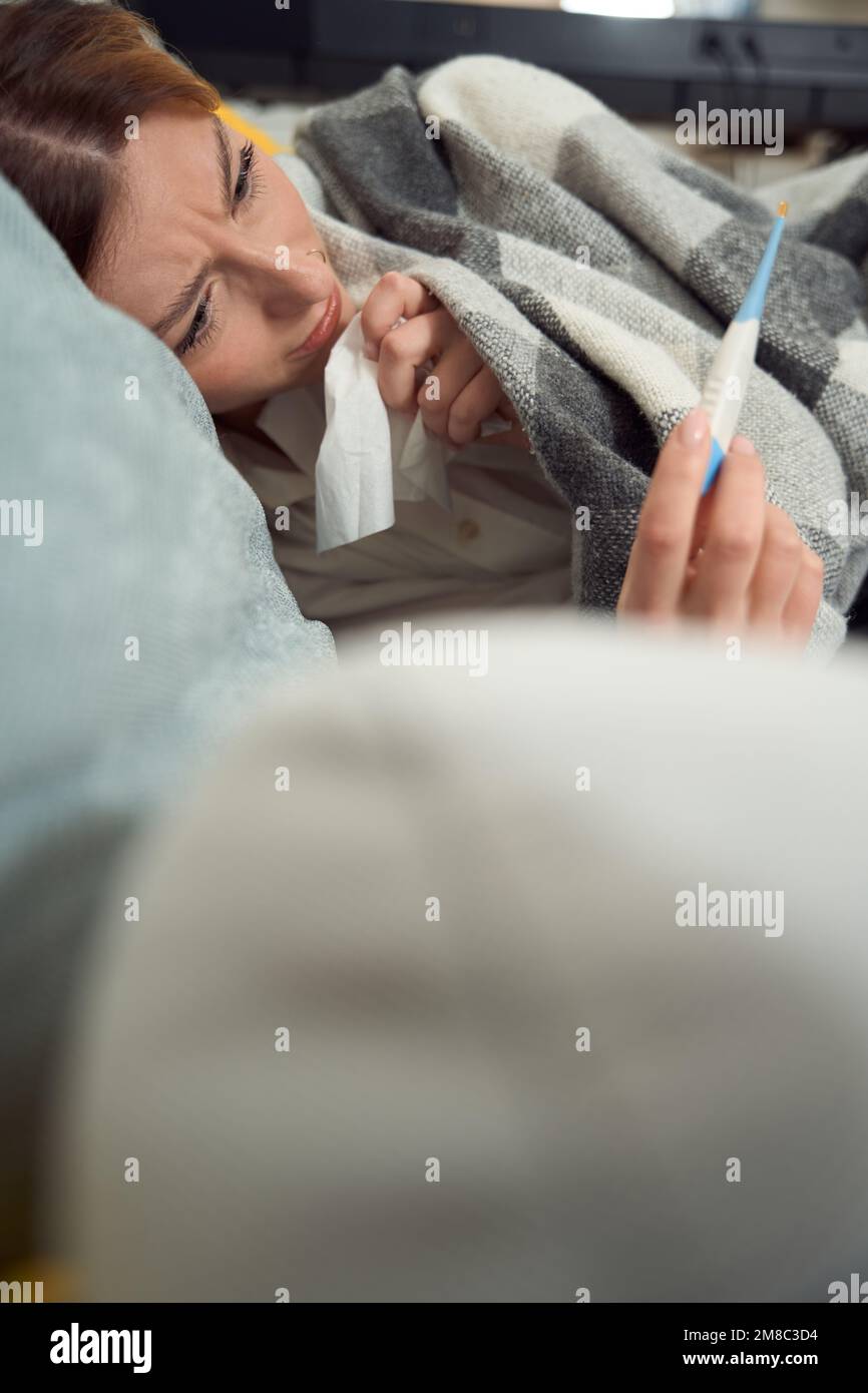 Taking body temperature hi-res stock photography and images - Alamy