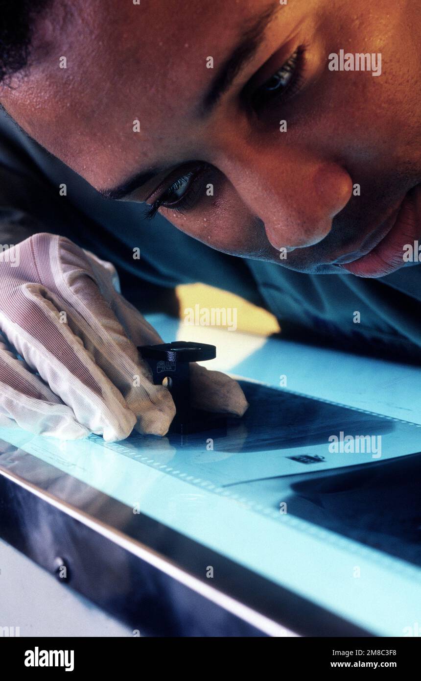 A1C Floyd Wilson, an imagery interpretation specialist with the 7426th ...