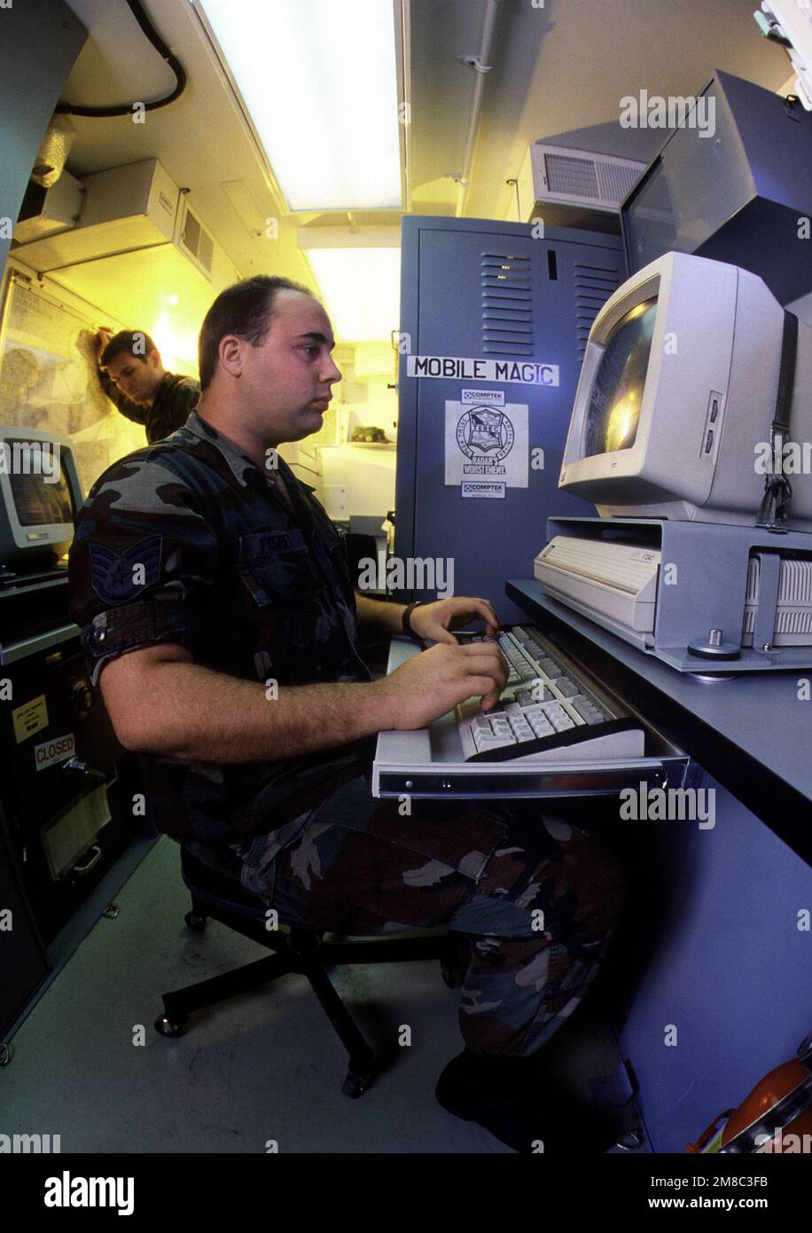 SSGT Mike Fischer inputs data on a Tactical Electronic Reconnaissance ...