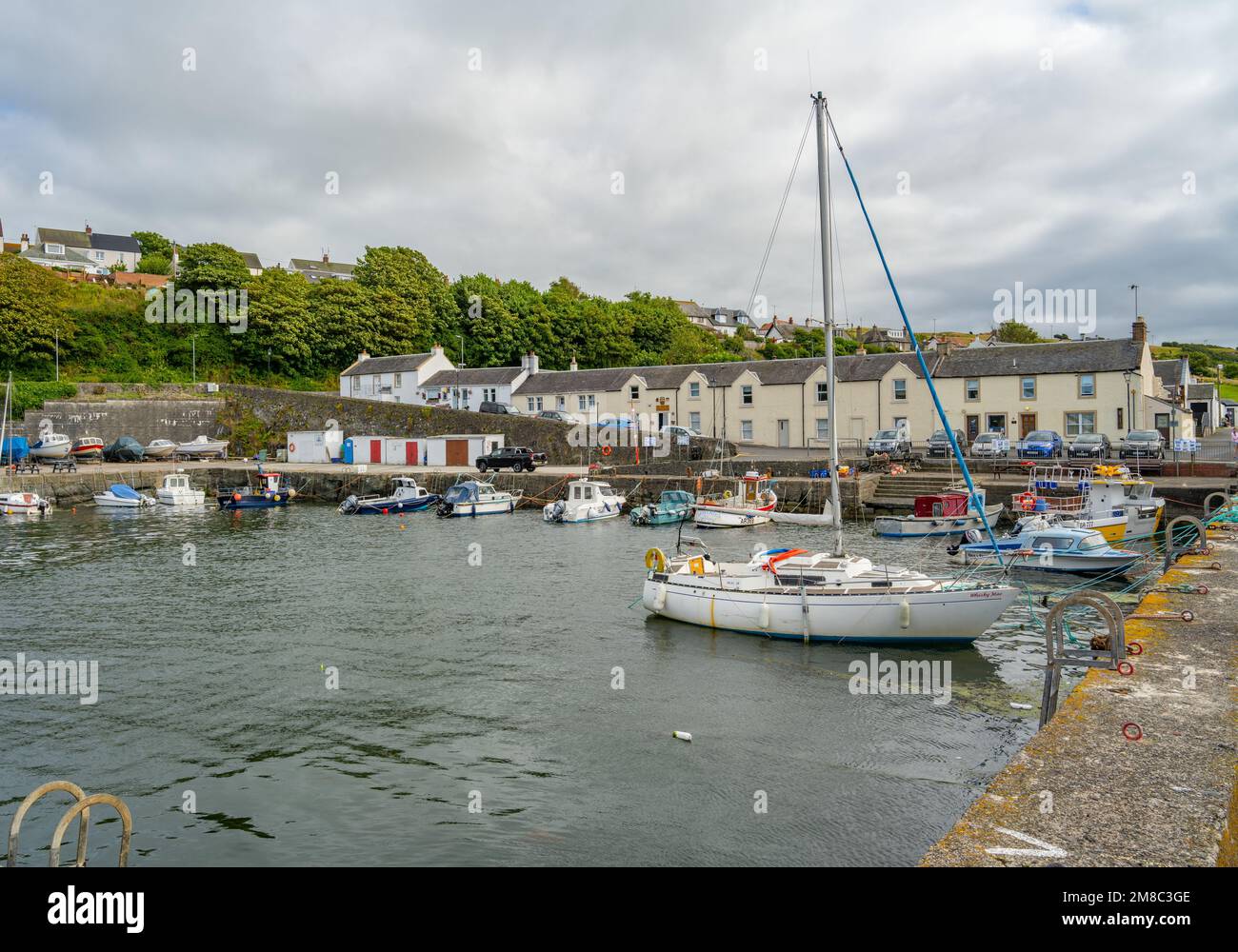 Boats moored in the old fishing harbour of Dunure Ayrshire Scotland ...