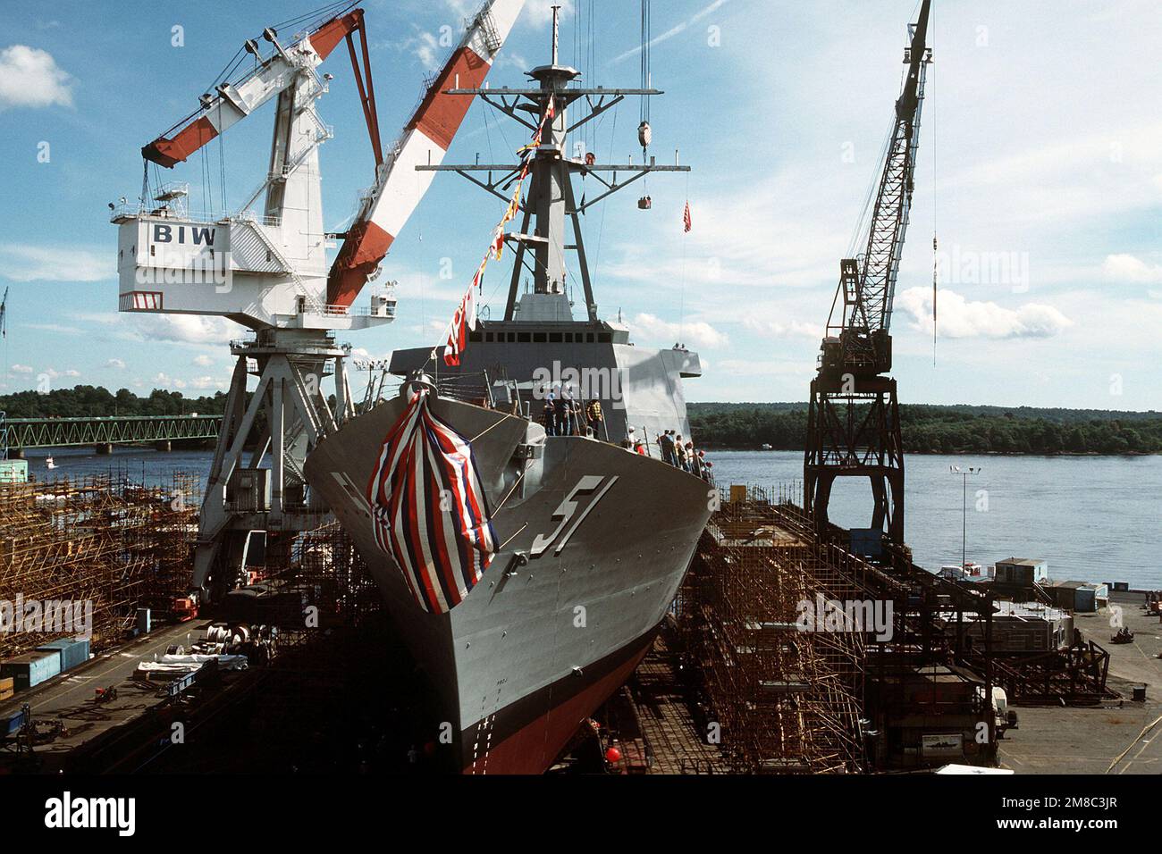 The guided missile destroyer ARLEIGH BURKE (DDG 51) sits on the ways at ...