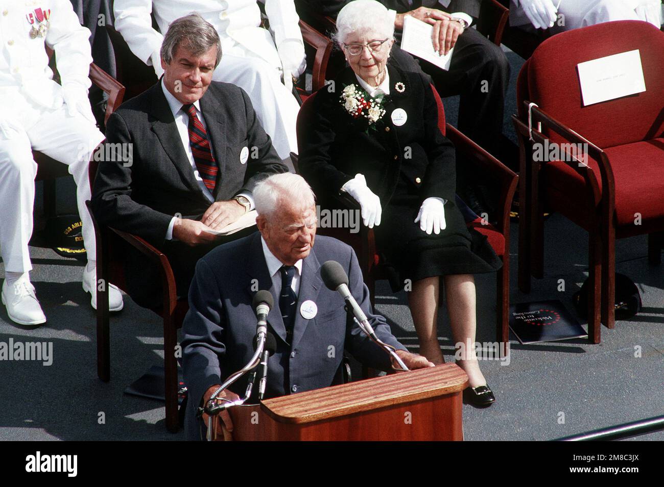 Retired Admiral Arleigh Burke speaks during the christening and launch ...