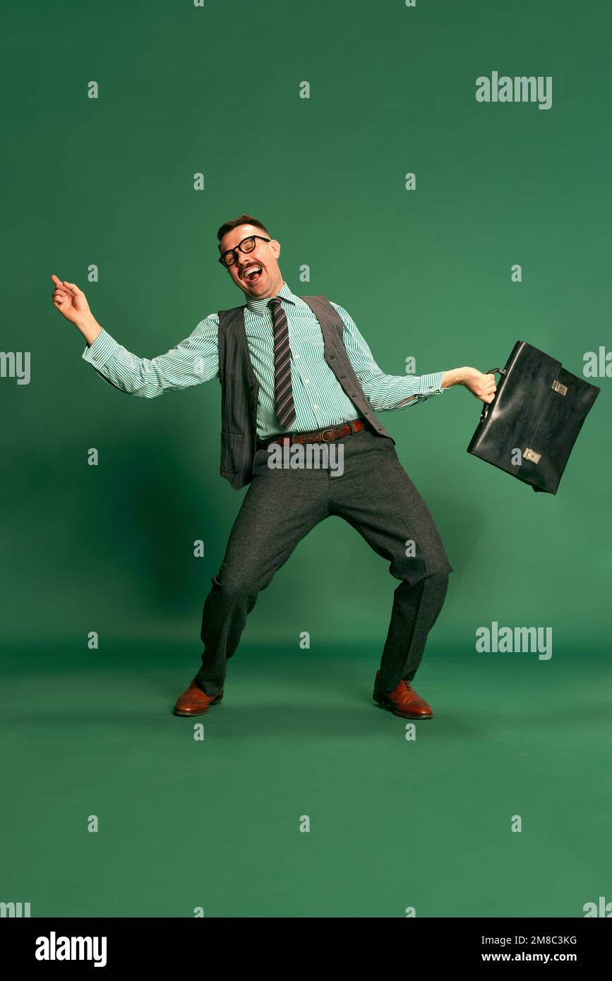 Joy. Delightful. Portrait of handsome man, businessman in classical ...
