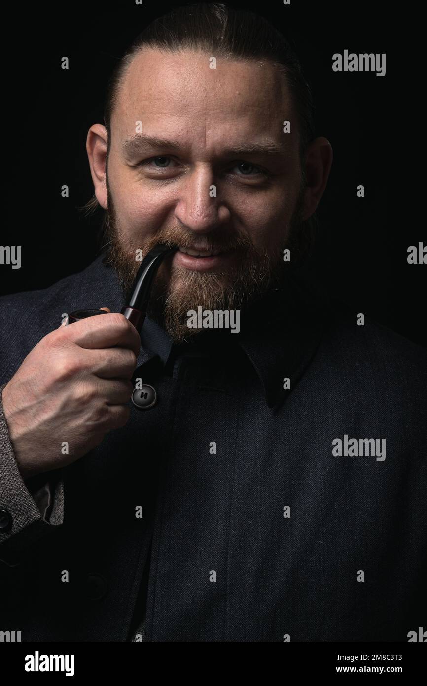 stylish man in retro outfit suit hat smoking wooden pipe sherlock ...
