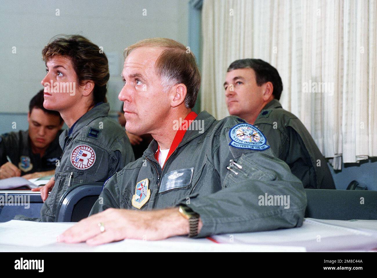 LT. COL. Erv Robinson, center, and other members of the 19th Aerial ...