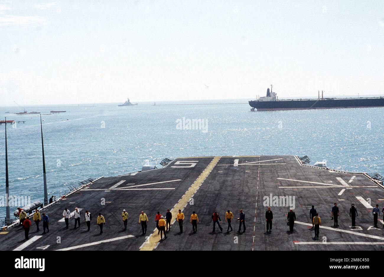 Crewmen Aboard The Amphibious Assault Ship Uss Peleliu Lha 5 Spread