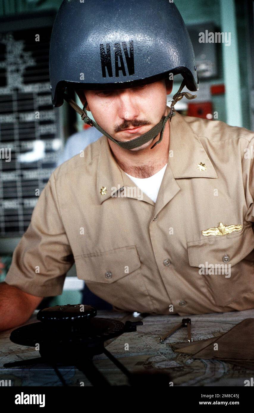 The navigator aboard the amphibious assault ship USS PELELIU (LHA 5 ...