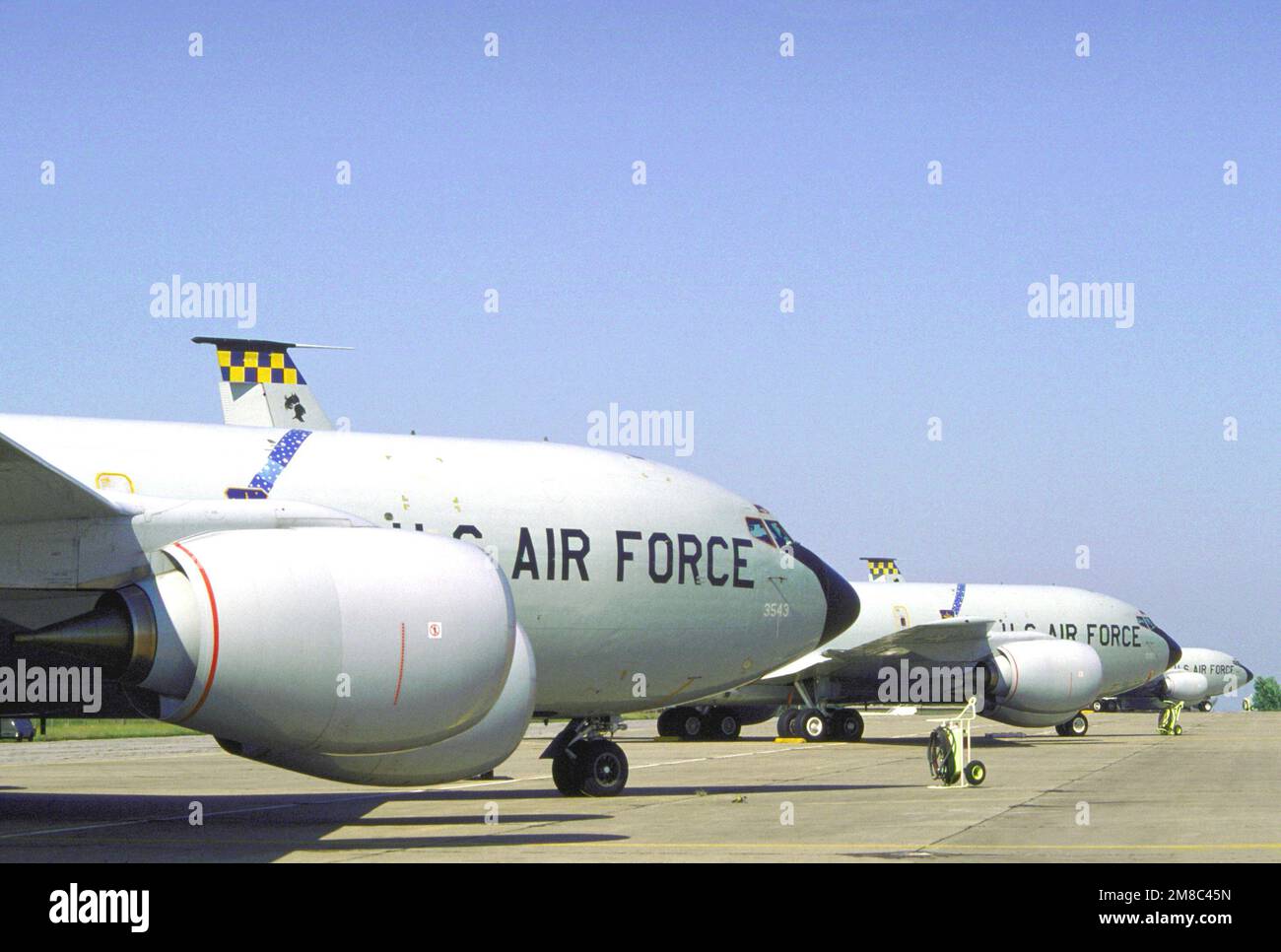 Three KC-135R Stratotanker aircraft of the 19th Aerial Refueling Wing (19th AREFW) sit parked on ...