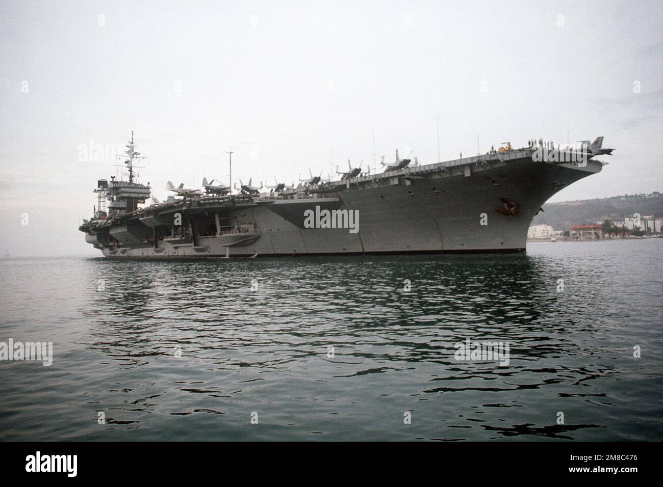 A starboard bow view of the aircraft carrier USS CONSTELLATION (CV-64 ...