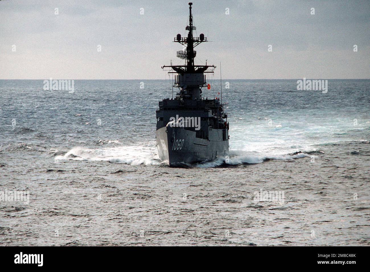 A bow view of the frigate USS LANG (FF 1060) underway during PACEX '89 ...