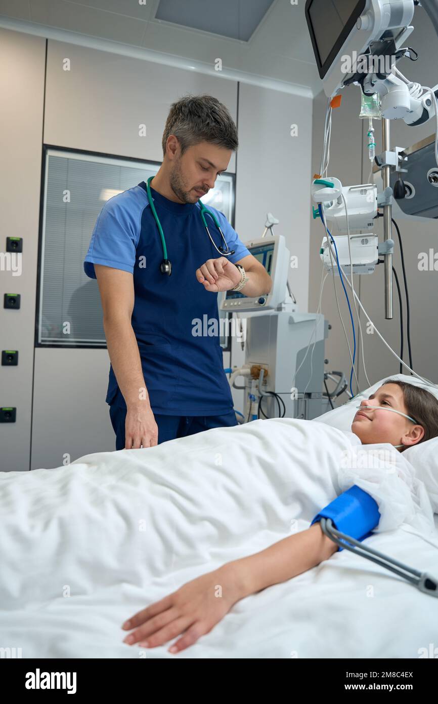 Young girl in intensive care on breathing support Stock Photo - Alamy