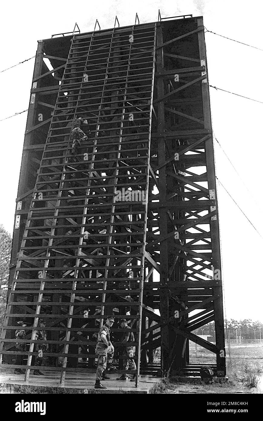 A Marine climbs a rappeling tower. Country: Unknown Stock Photo - Alamy