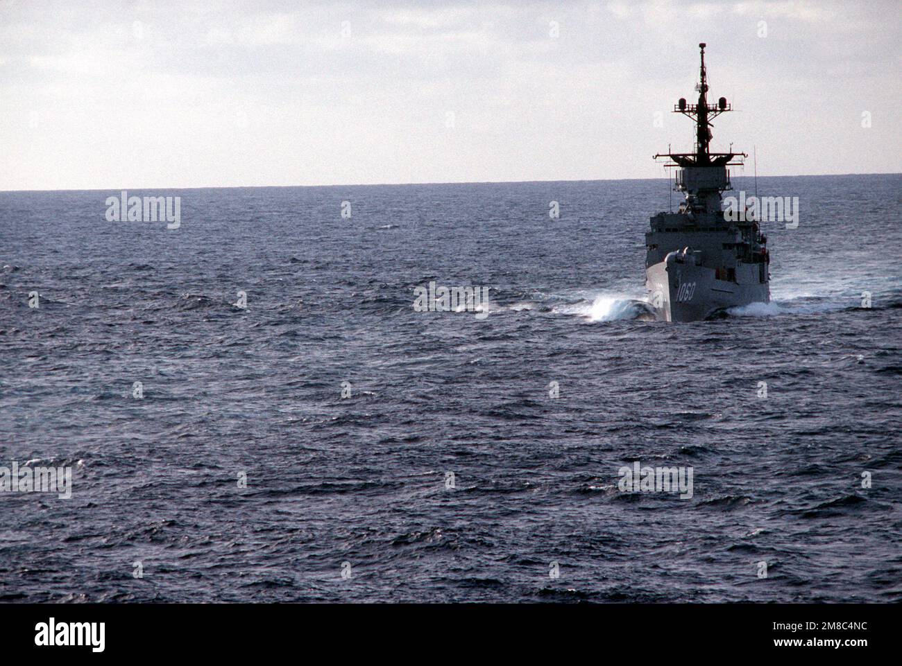 A bow view of the frigate USS LANG (FF 1060) underway during PACEX '89 ...