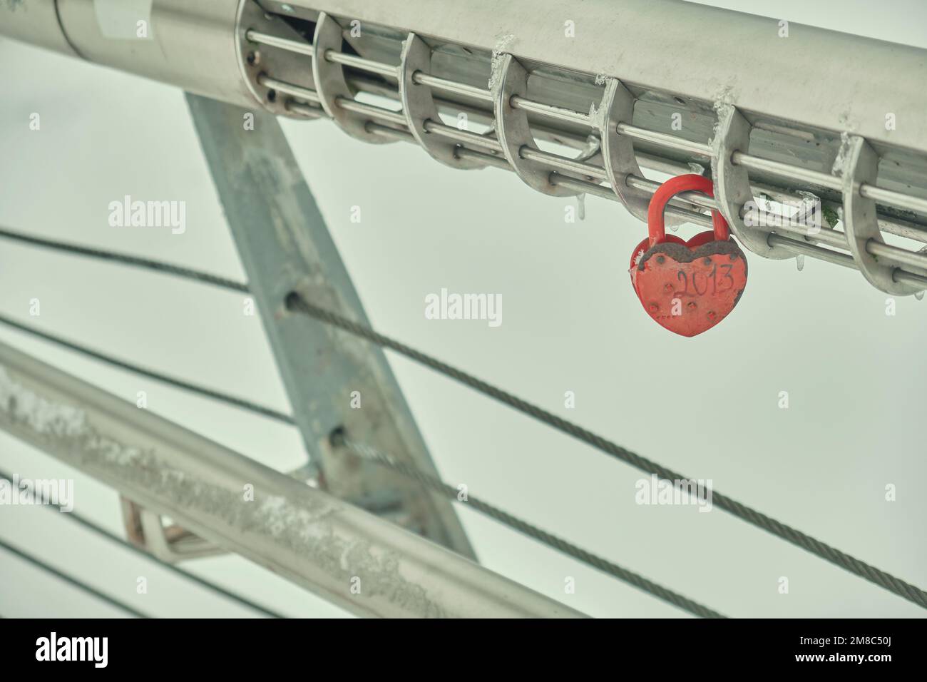 Frozen padlocks are installed along the bridge path and the love locks ...
