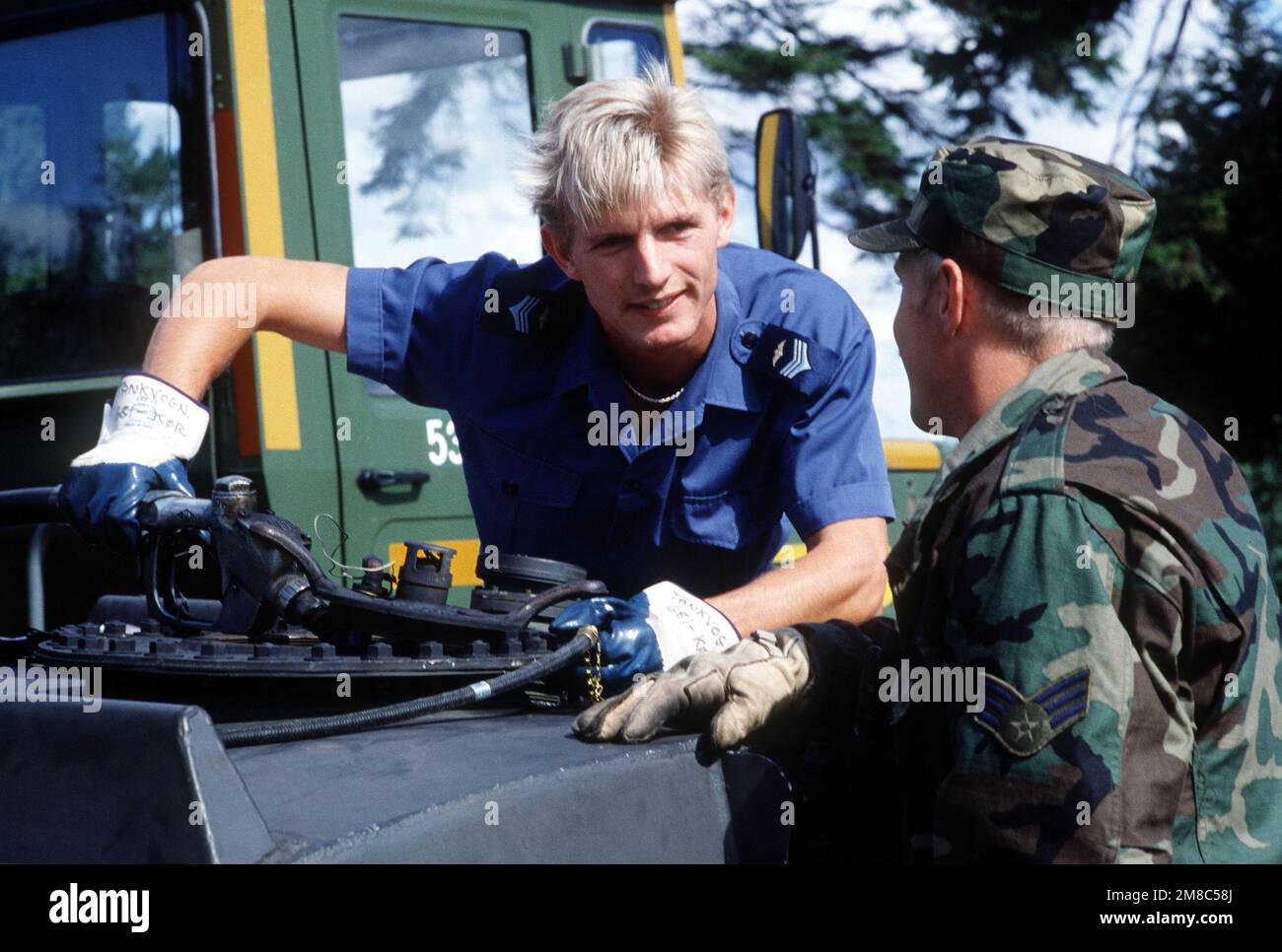 SGT Dean Gravning, right, an Air National Guardsman from the state of ...