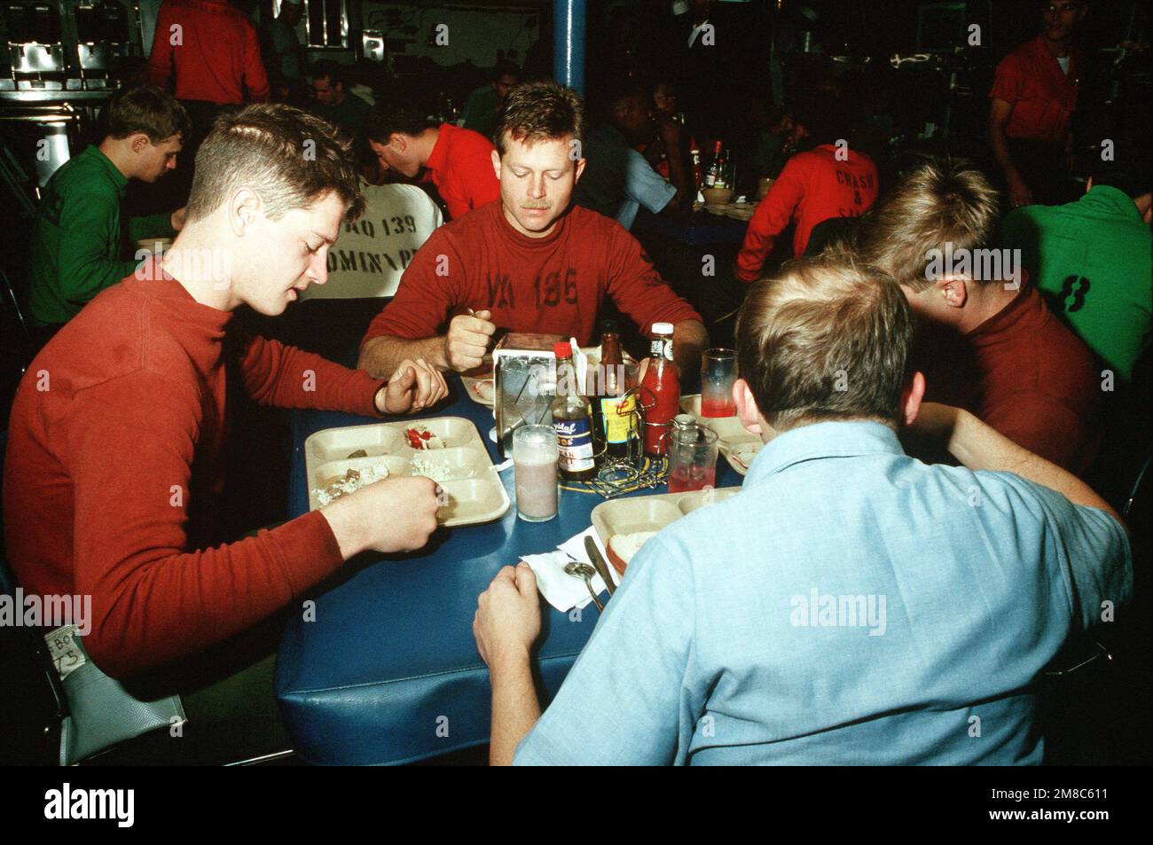 Flight deck crewmen aboard the aircraft carrier USS CONSTELLATION (CV ...